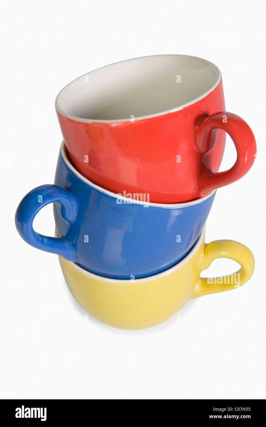 Close-up of a stack of colorful tea cups Stock Photo - Alamy