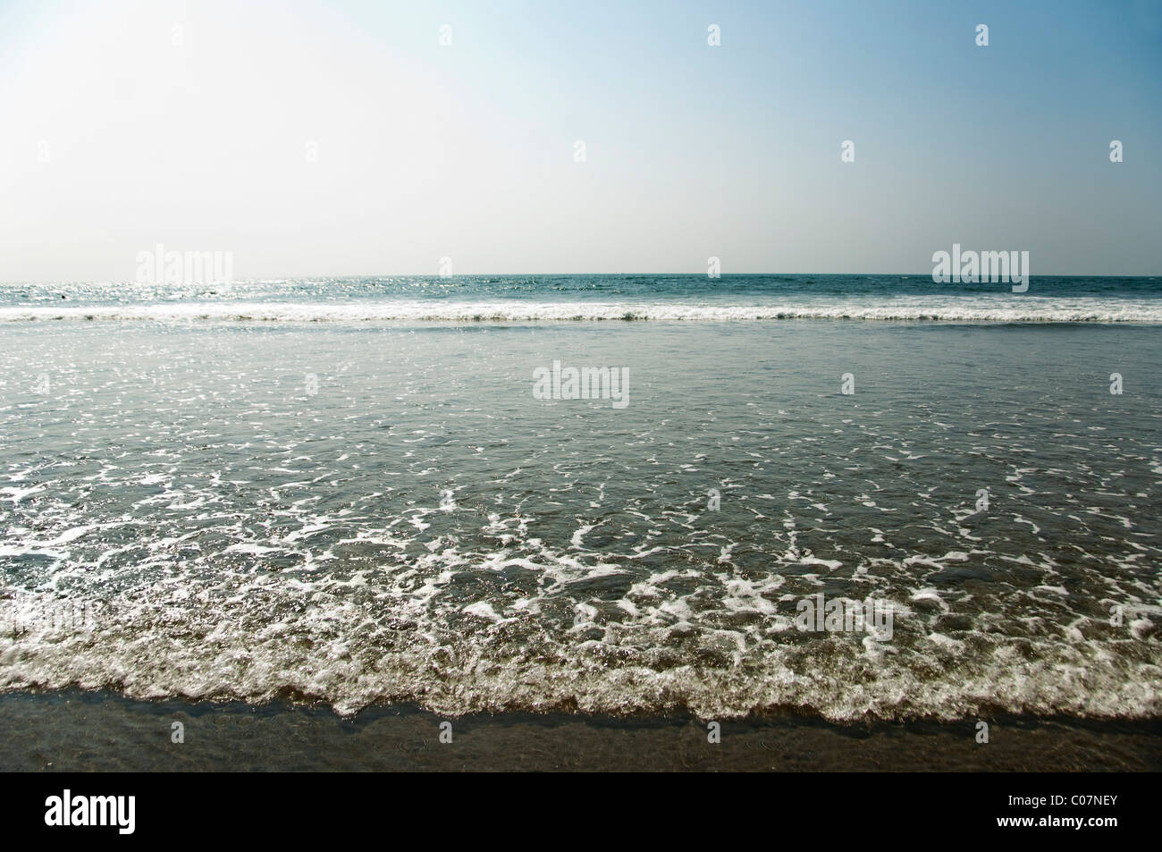 Surf on the beach, Goa, India Stock Photo - Alamy