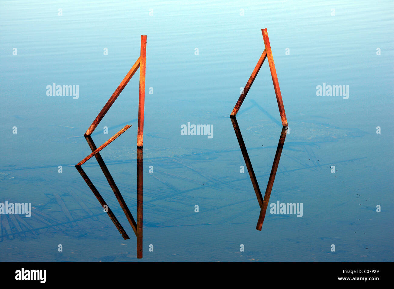 Reflections of rusty metal structures in Loch Lomond Stock Photo - Alamy