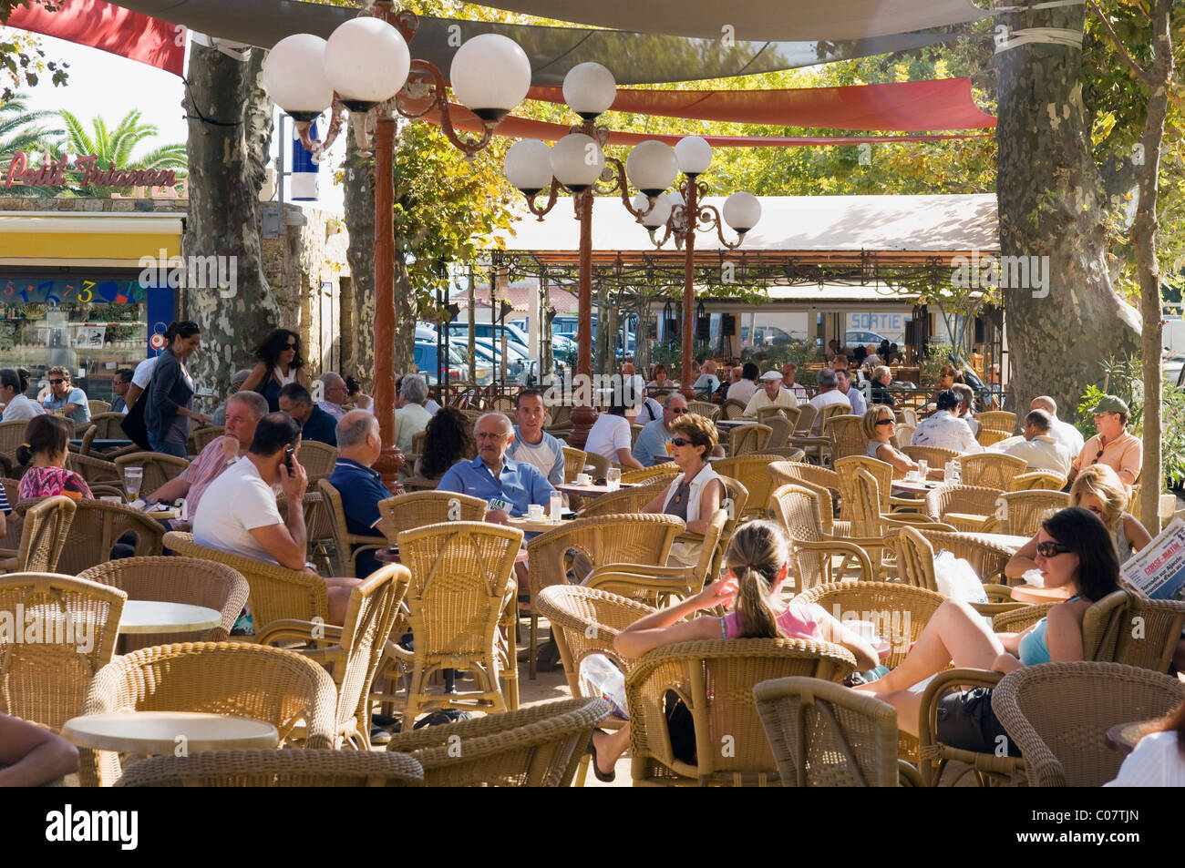 Cafe with plane trees, Ile Rousse, Balagne, island of Corsica, France ...