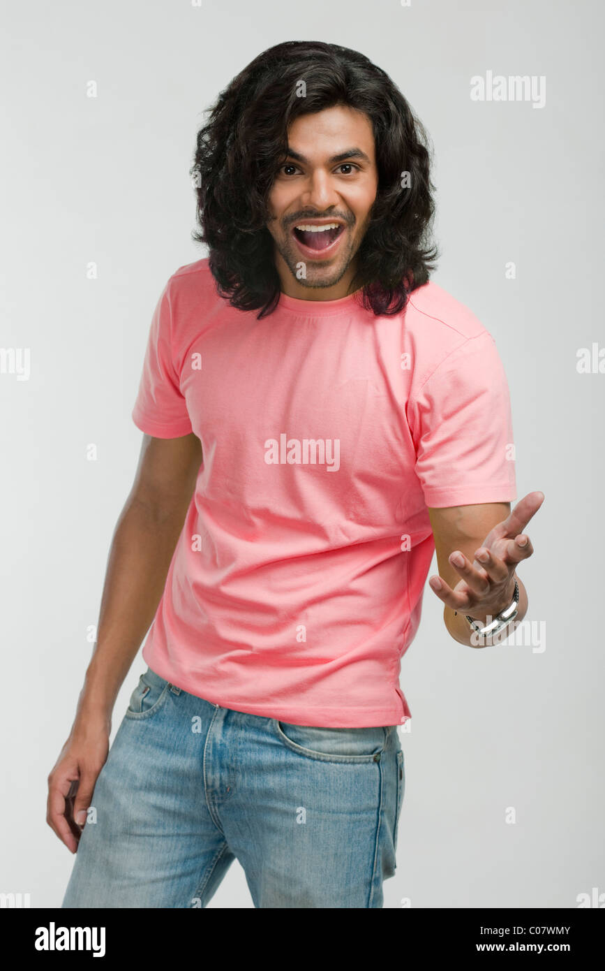 Portrait of a man gesturing Stock Photo - Alamy