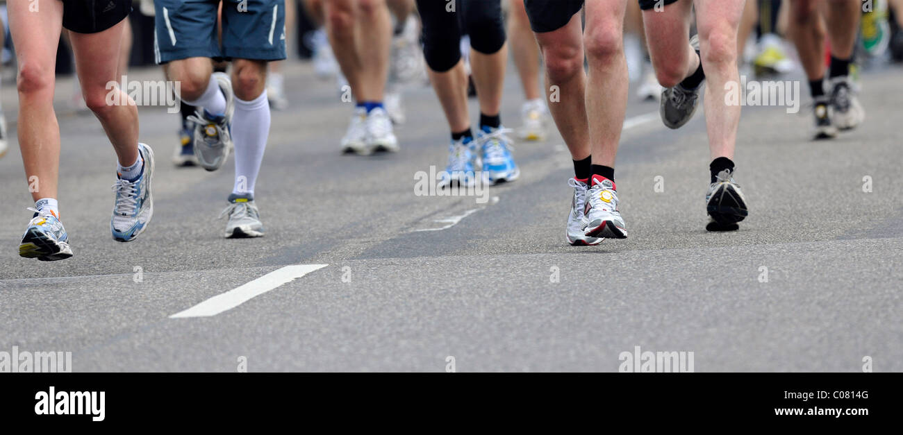 Marathon runners, running shoes Stock Photo - Alamy