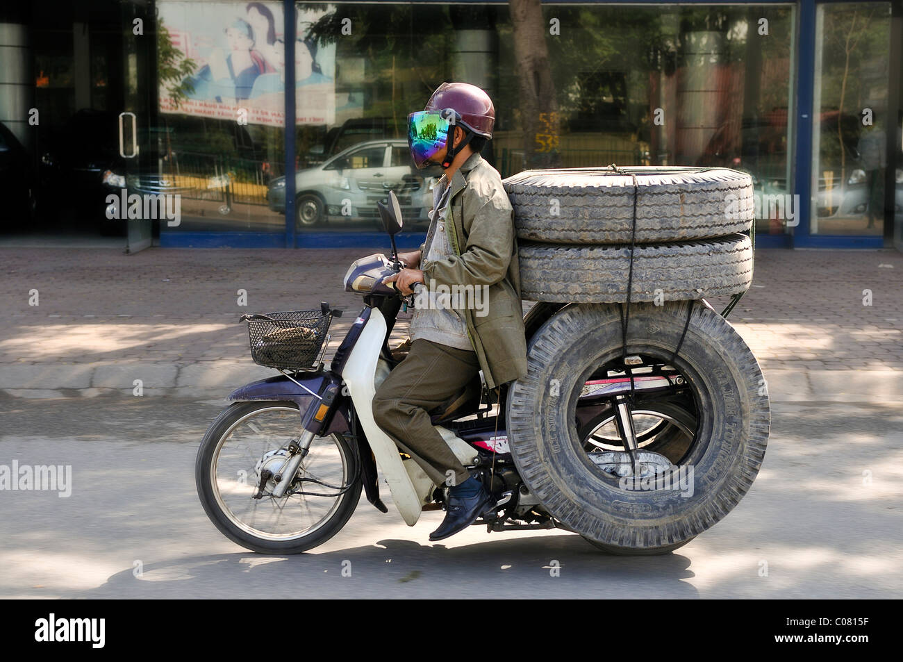 Scooter loaded with tires, Hanoi, Vietnam, Southeast Asia Stock Photo ...