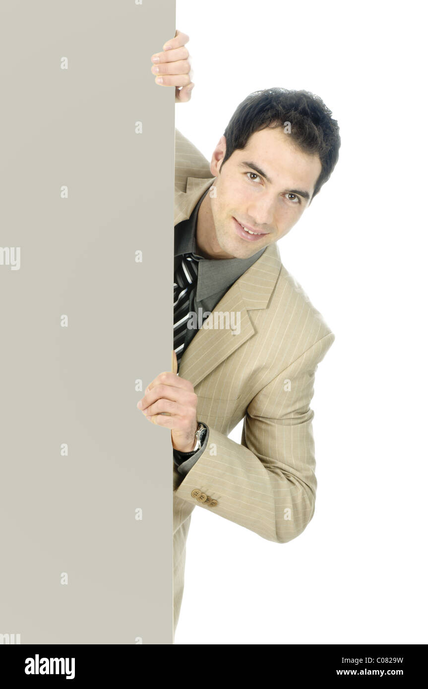 Businessman with sign in hand Stock Photo - Alamy