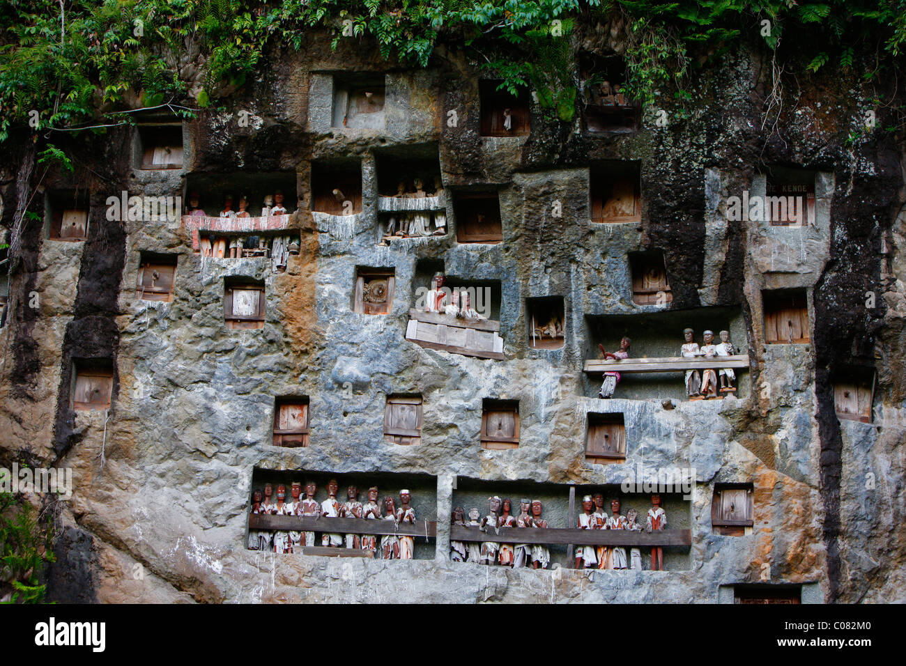Rock tombs with figures, ancestral gallery, Lemo, Toraja culture ...