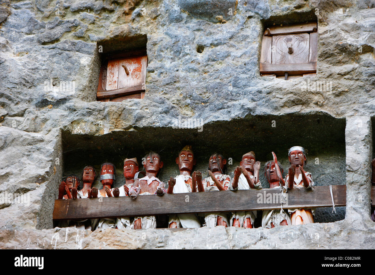 Rock tombs with figures, ancestral gallery, Lemo, Toraja culture ...