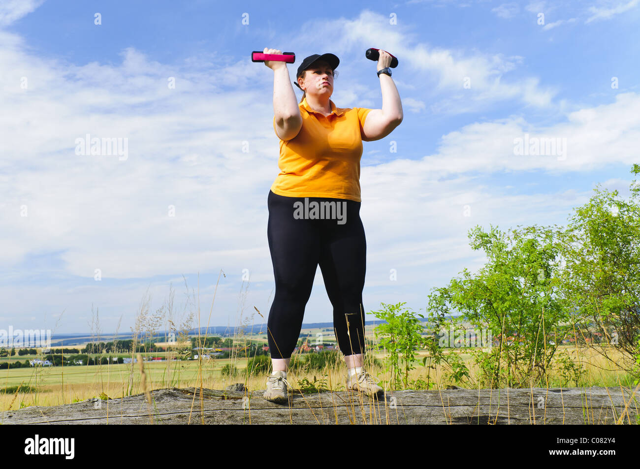 XL model, obese woman makes outdoor sports Stock Photo - Alamy