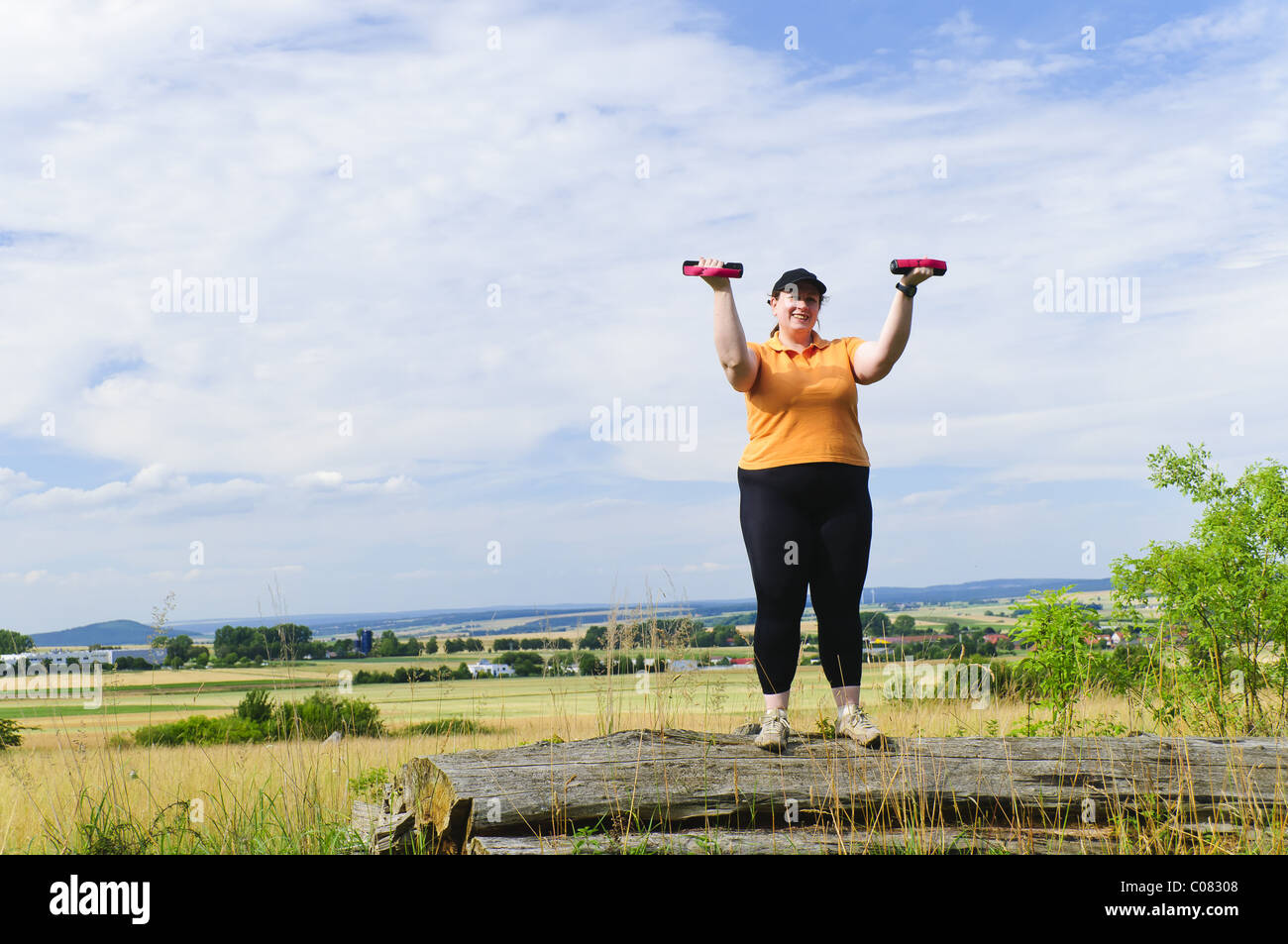 XL model, obese woman makes outdoor sports Stock Photo - Alamy