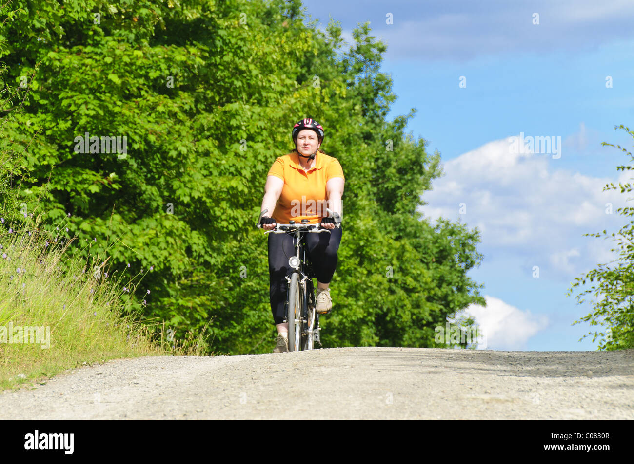 XL model, overweight women cycling Stock Photo - Alamy