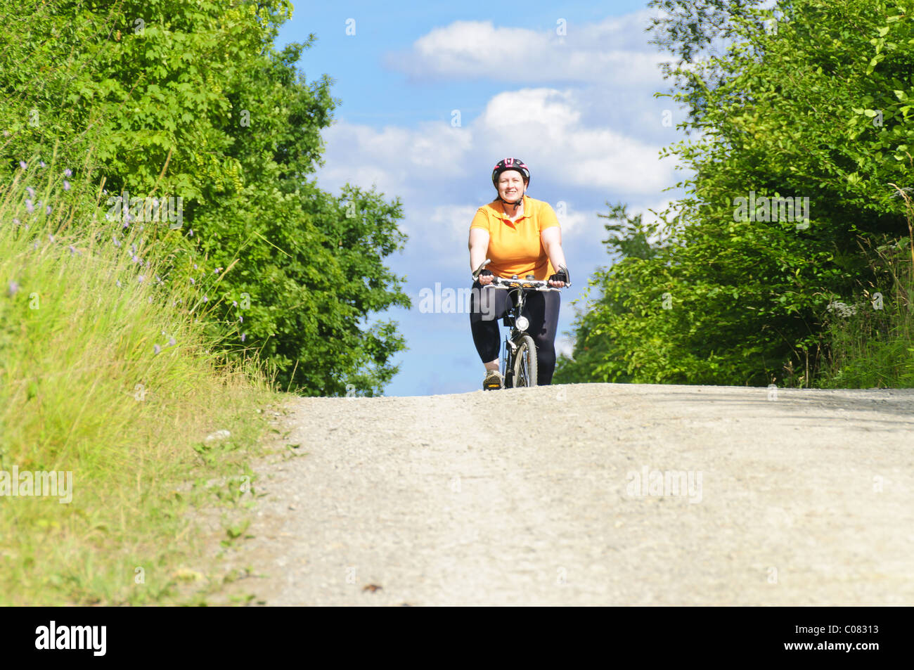 XL model, overweight women cycling Stock Photo - Alamy