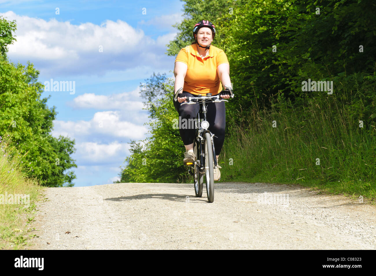 XL model, overweight women cycling Stock Photo - Alamy