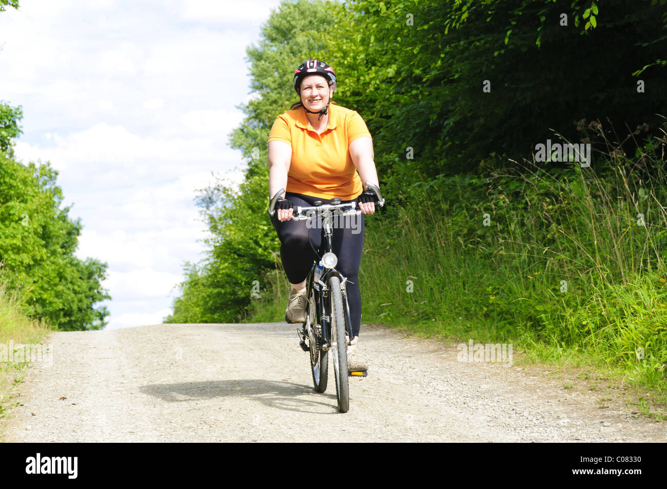 XL model, overweight women cycling Stock Photo - Alamy