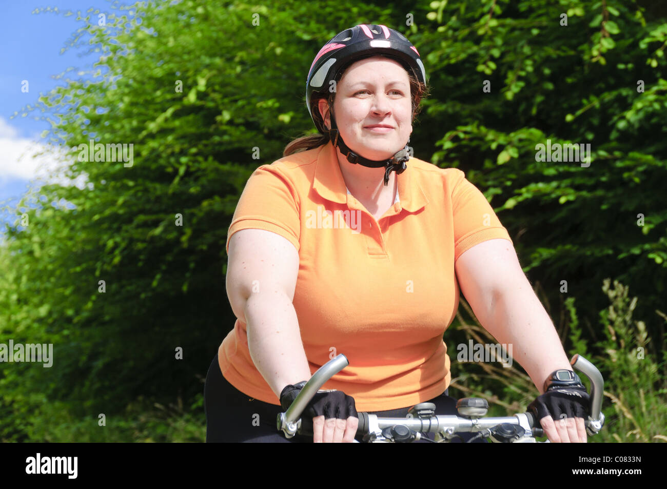 XL model, overweight women cycling Stock Photo - Alamy