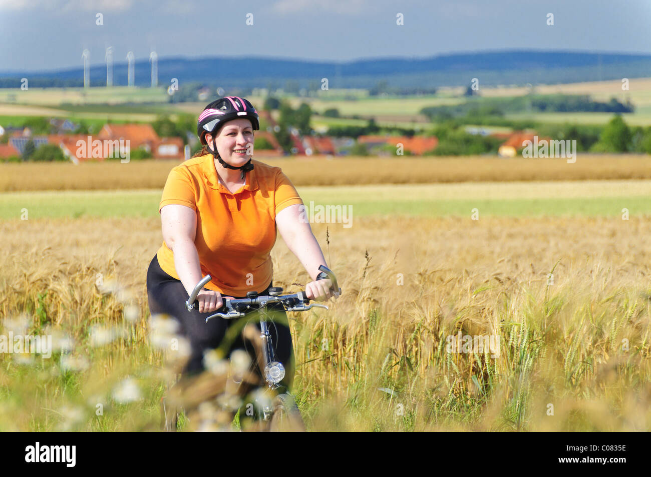 XL model, overweight women cycling Stock Photo - Alamy