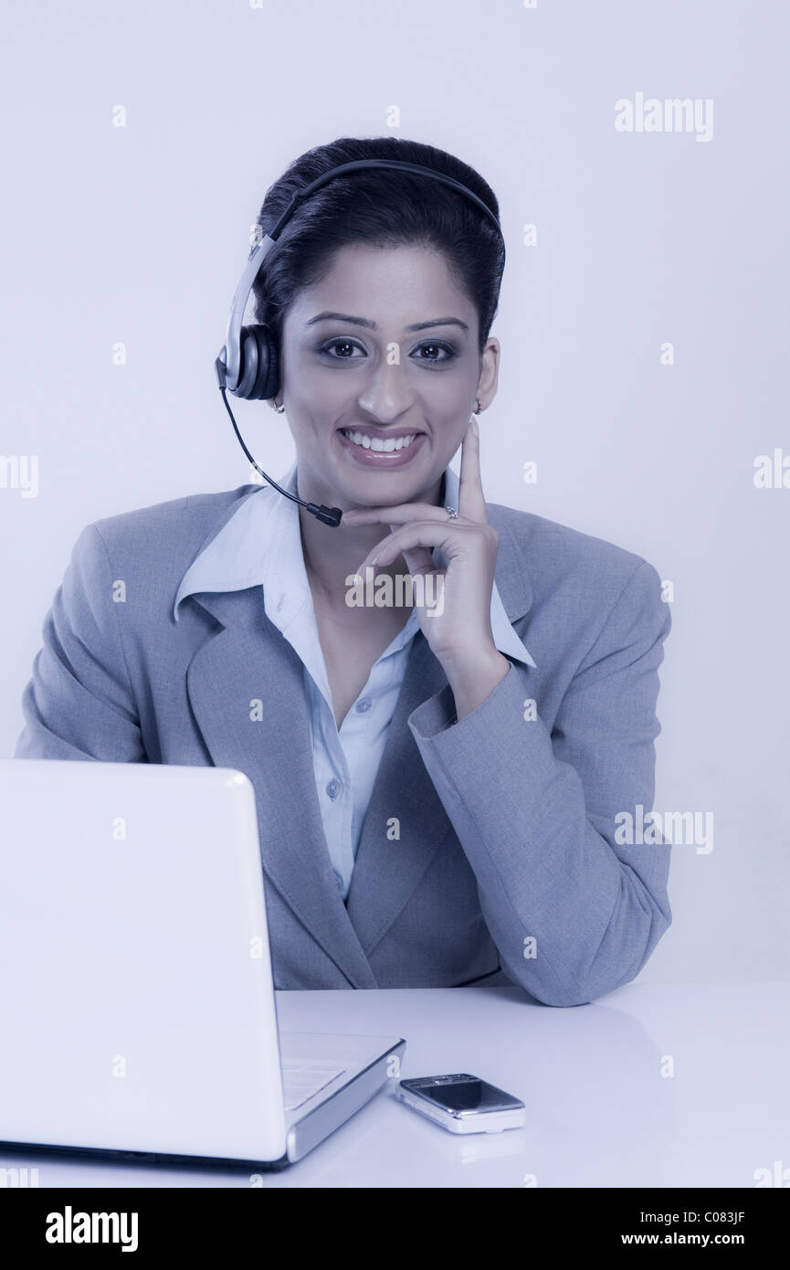 Portrait of a female customer service representative Stock Photo - Alamy