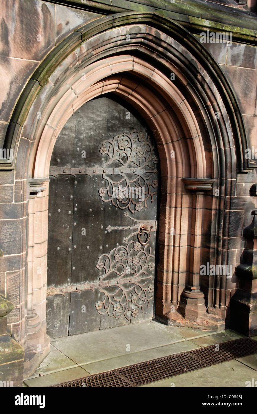 A medieval door with heavy iron banding and hinges at Chester Cathedral ...