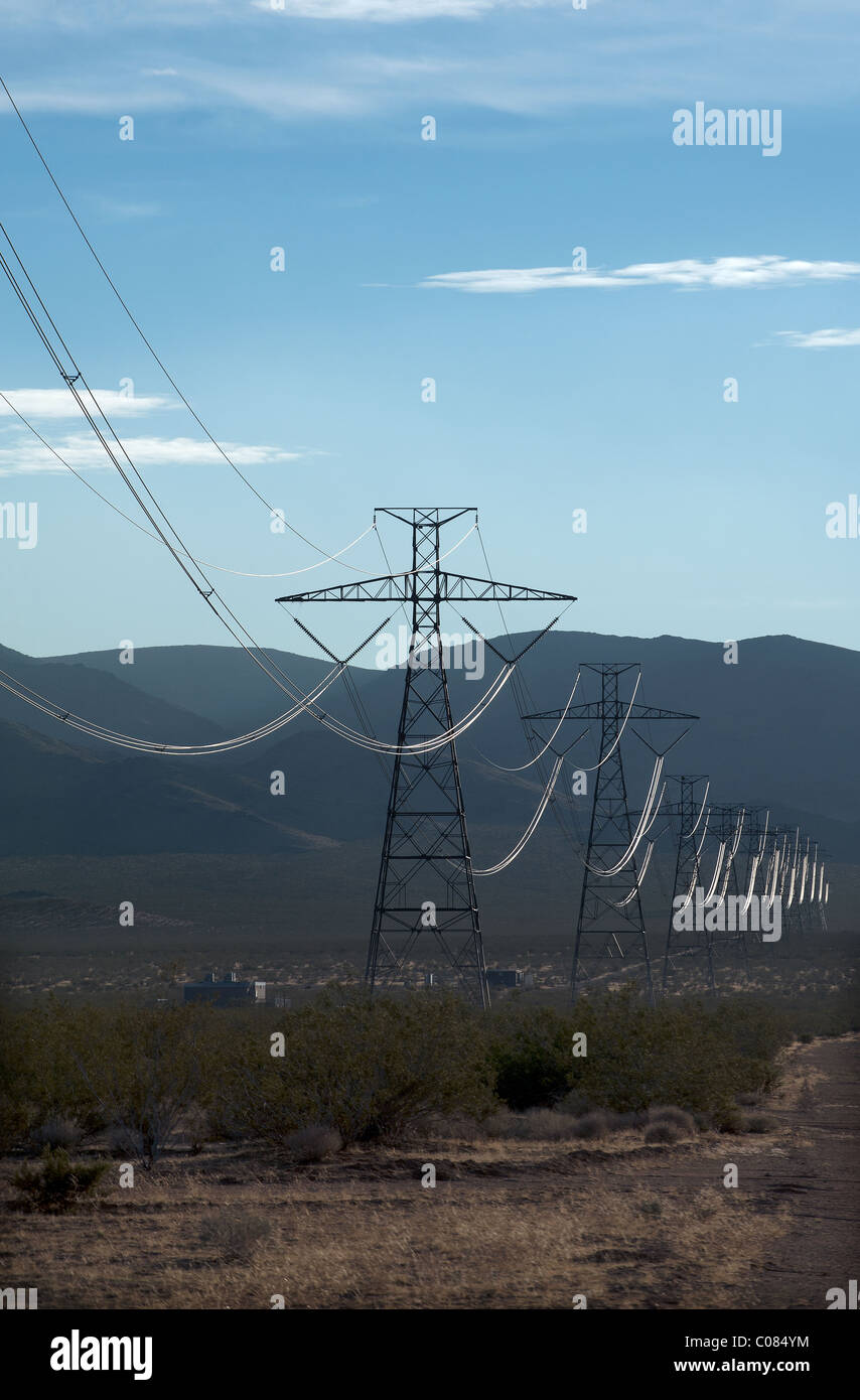 Electricity pylons in the Mojave desert, California, USA at sunset ...