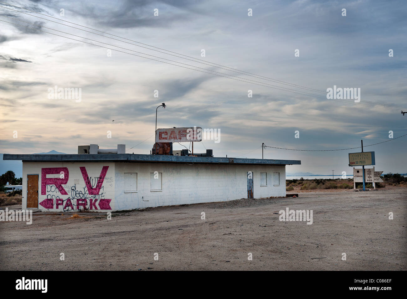 Abandoned building at the entrance of an RV park on the shore of Salton ...