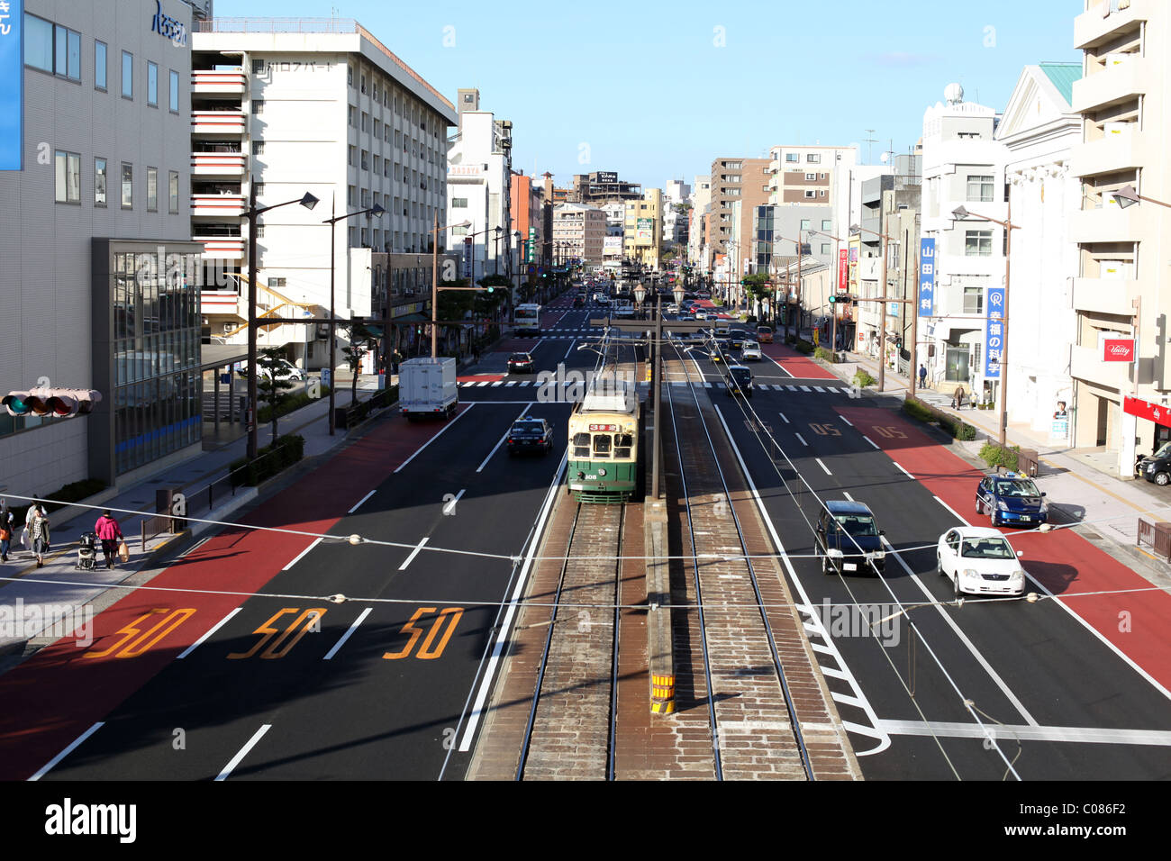 Tramline along main road through Urakami, Nagasaki, Kyushu, Japan Stock ...