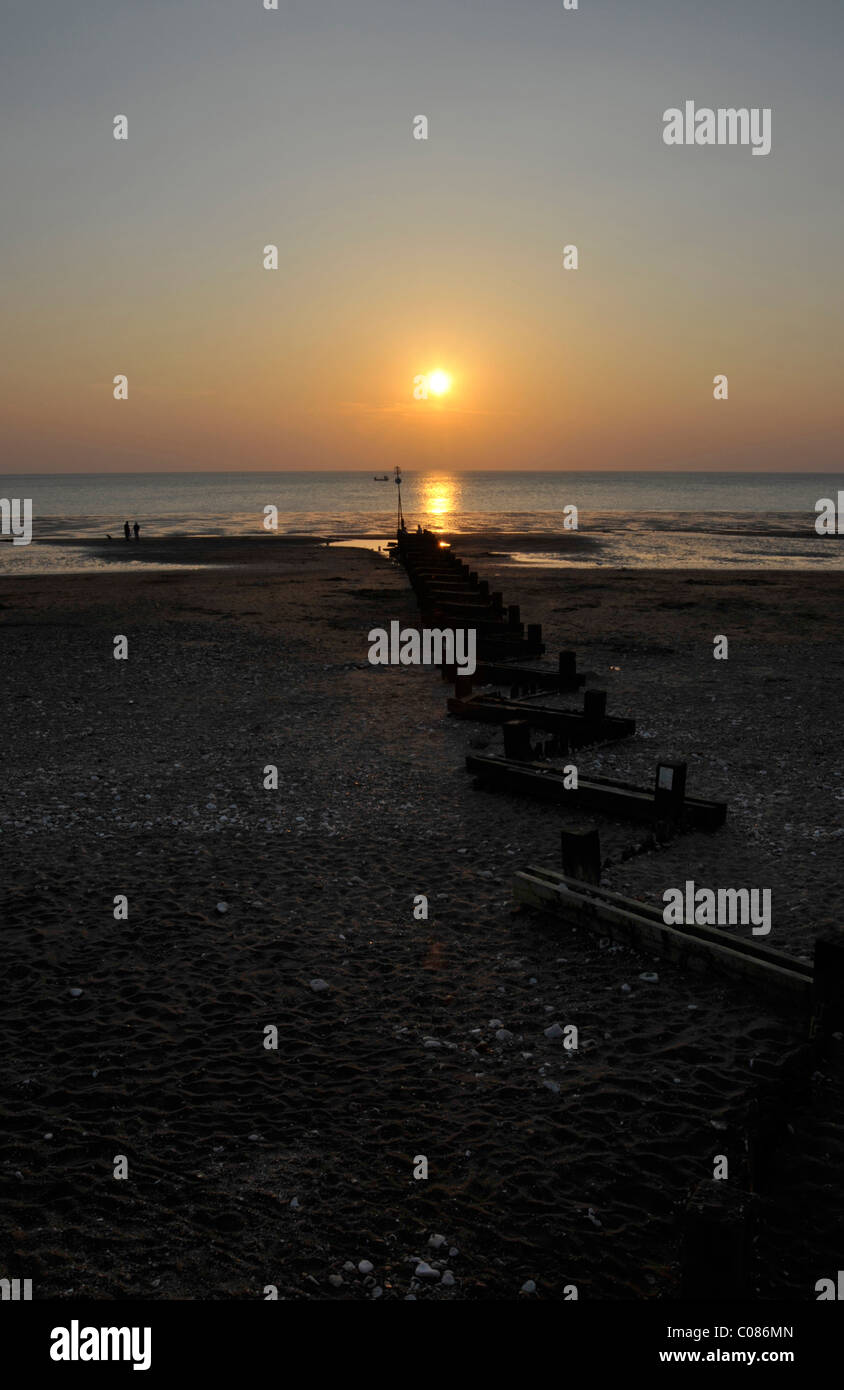 The sun setting over the Wash and Hunstanton beach in Norfolk, UK Stock ...