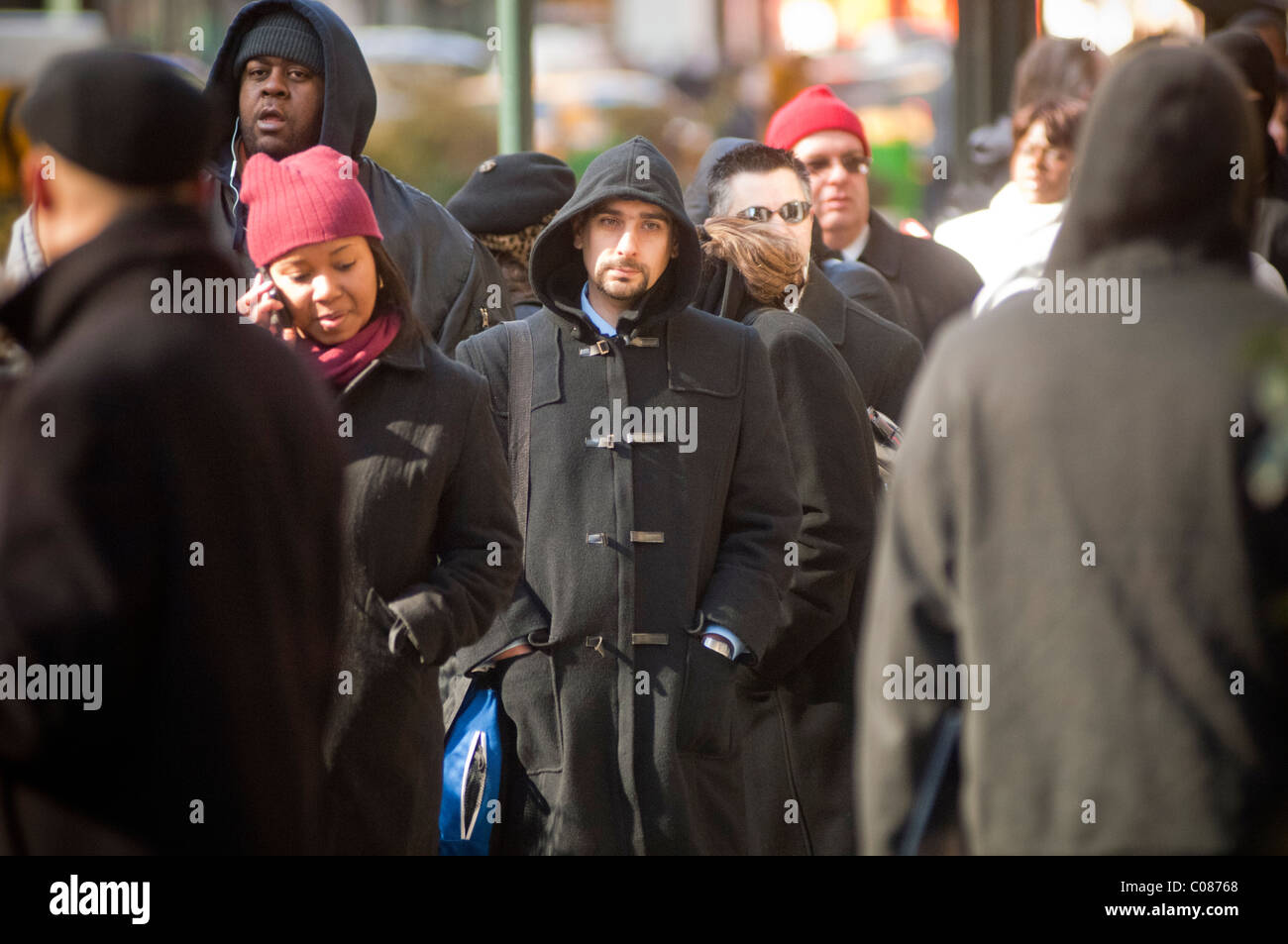 Job seekers line up for a job fair in midtown in New York on Tuesday ...