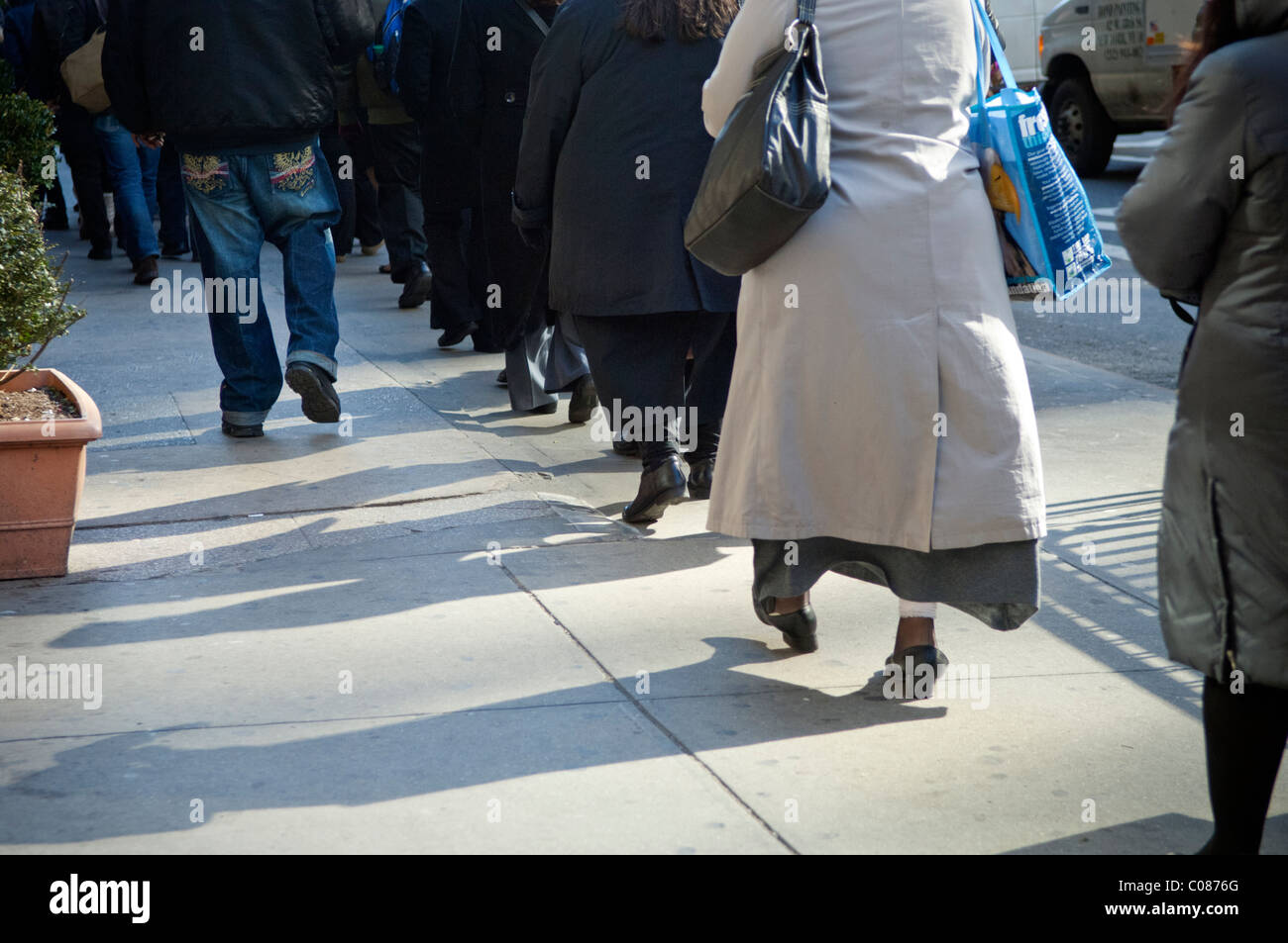 Job seekers line up for a job fair in midtown in New York on Tuesday ...