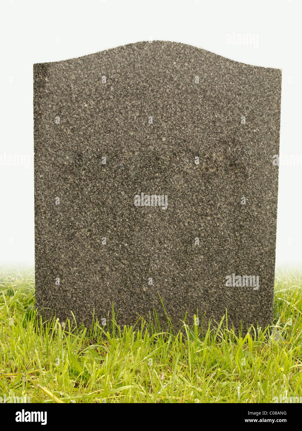 single grave stone on white back ground cut out Stock Photo - Alamy