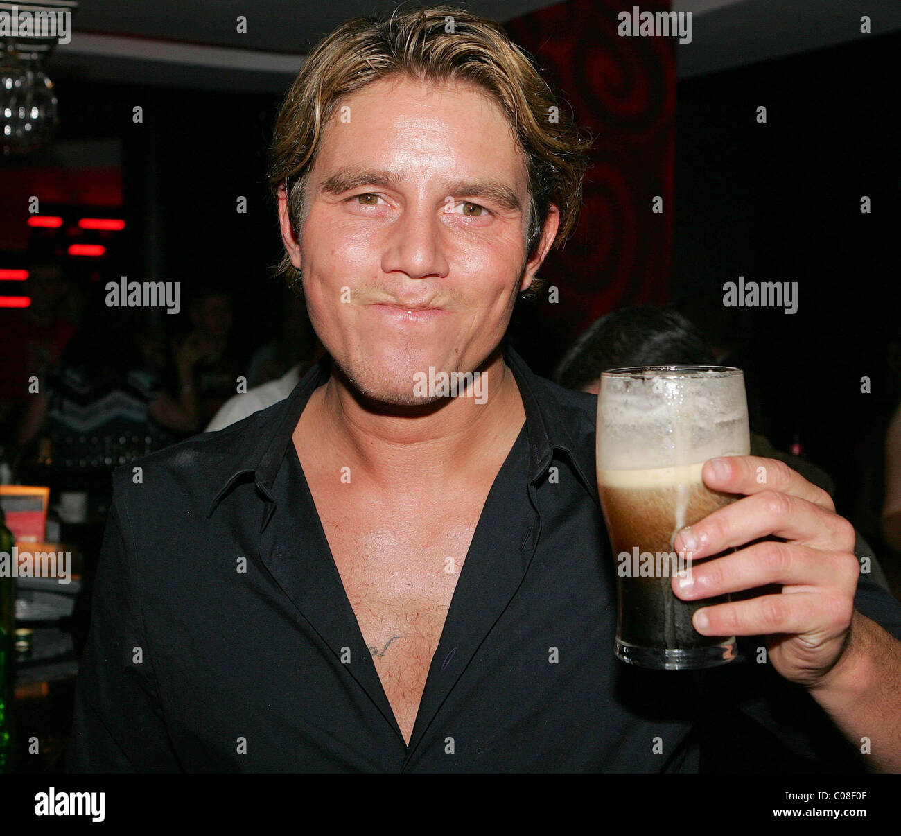 Ziggy aka Zac Lichman drinking a pint of Guinness at Earth nightclub in ...