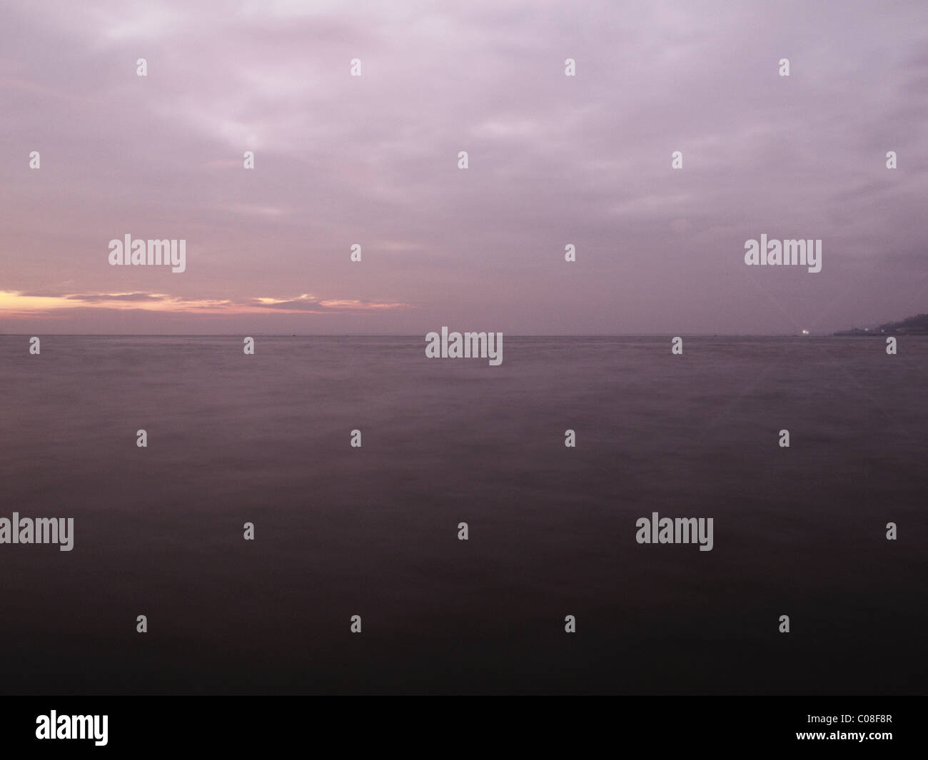 landscape image of south end on sea in essex england at sunset during ...