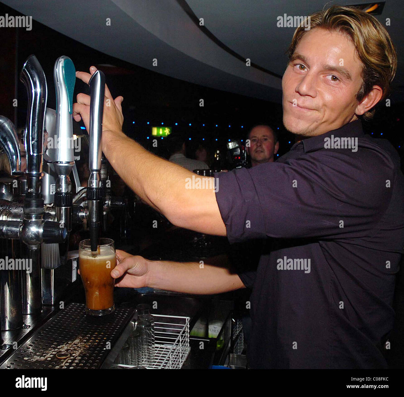 Ziggy aka Zach Lichman serving behind the bar at Earth nightclub in ...