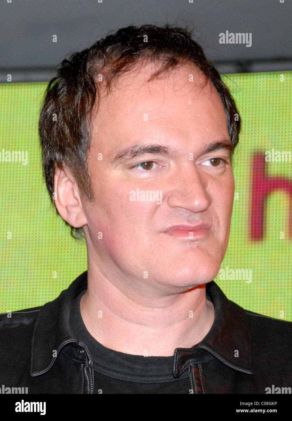 Quentin Tarantino signs copies of the script for his latest movie ...