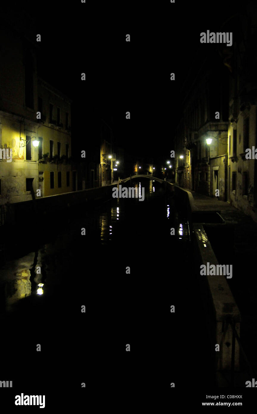 Venetian streets at night lit by streetlights Stock Photo - Alamy