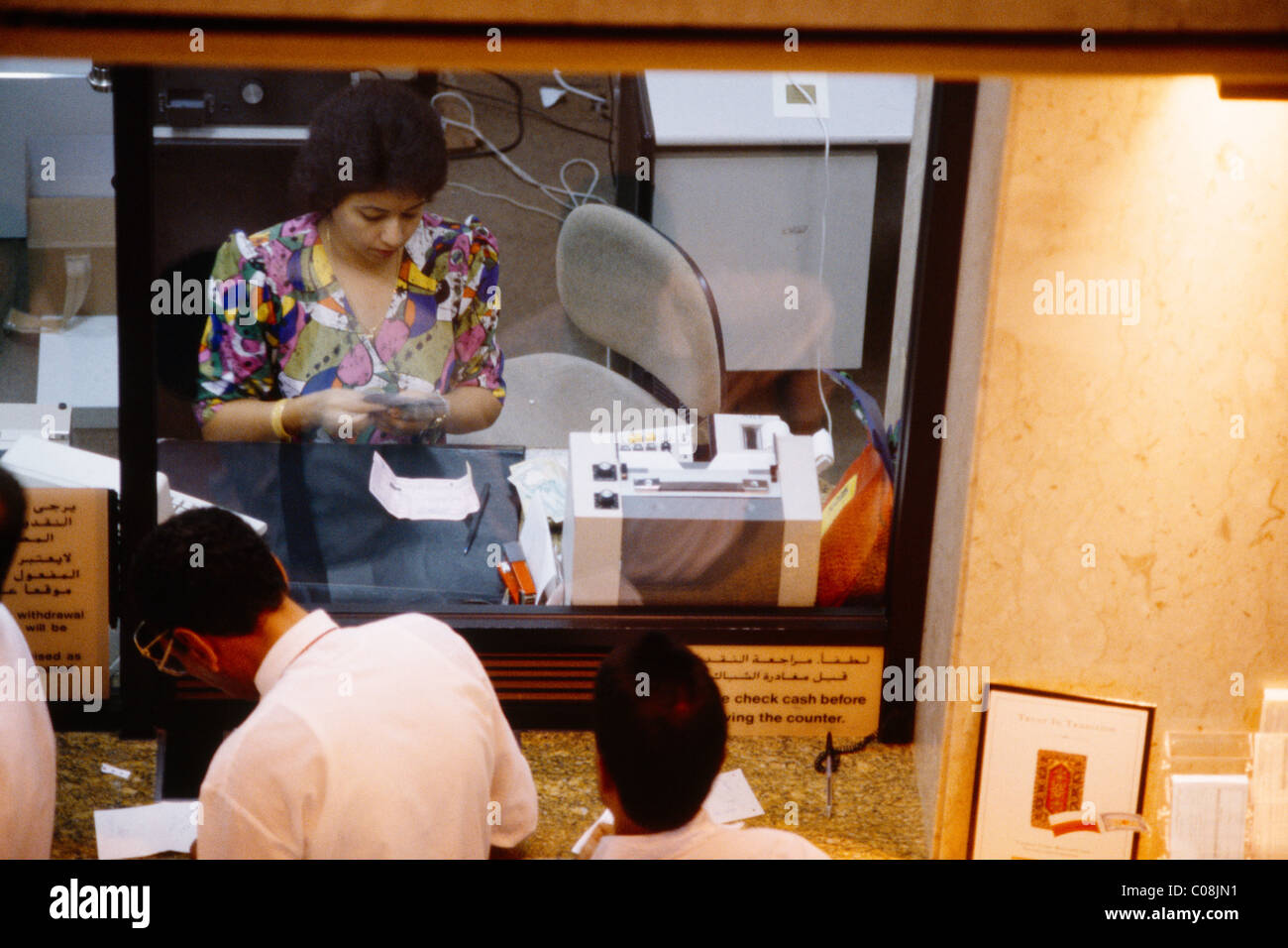 Woman bank cashier hi-res stock photography and images - Alamy