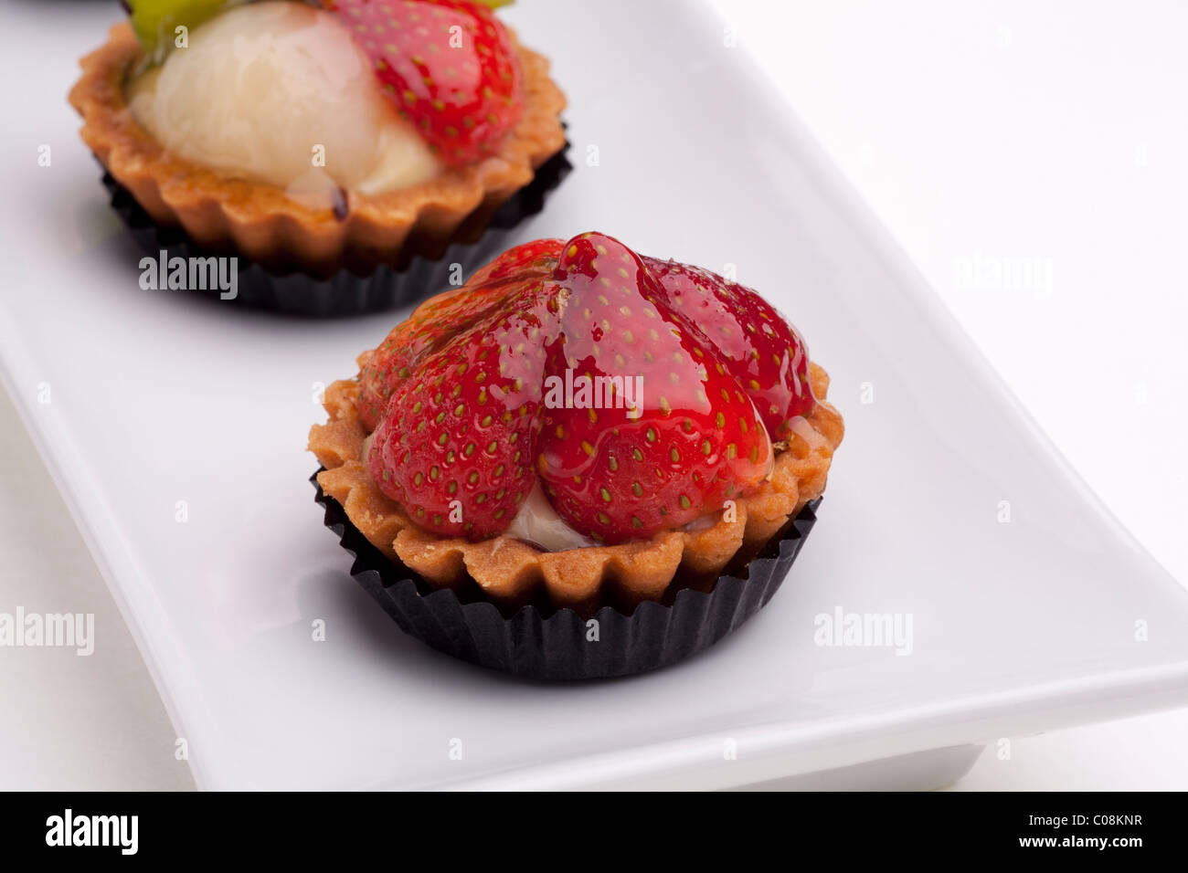 Assorted flavor fruits tart Stock Photo - Alamy