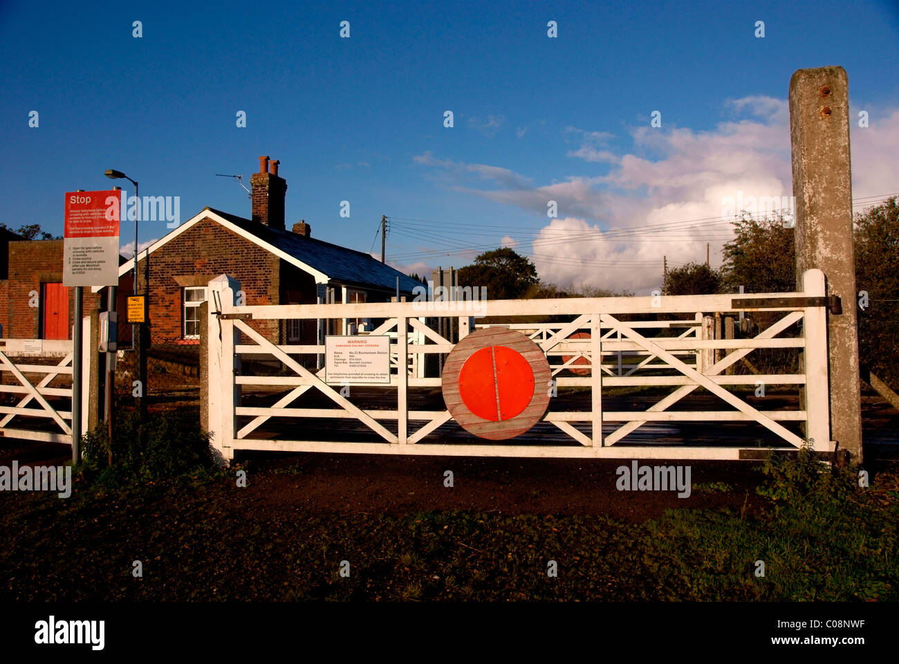 The self service level crossing at Buckenham railway station on the ...