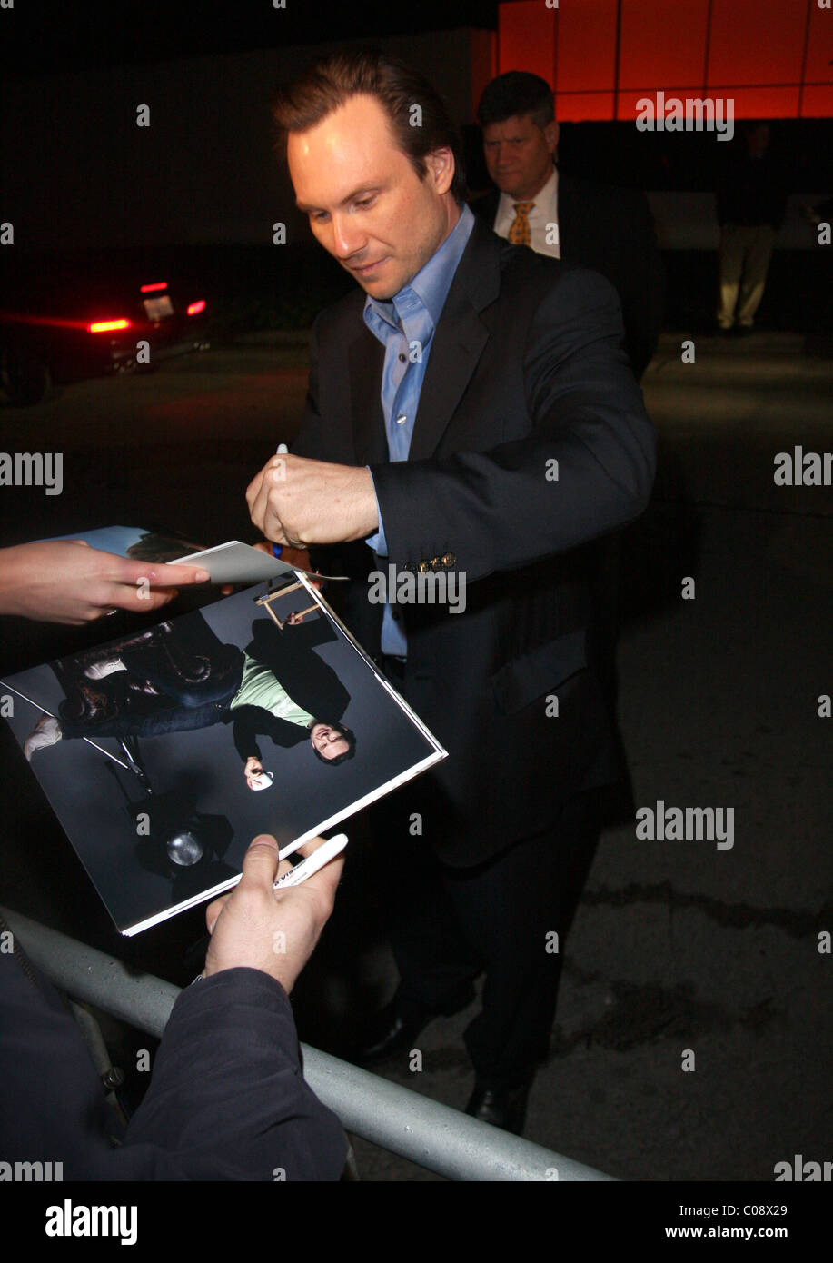 Christian Slater signs autographs for fans after leaving an Oscar party ...