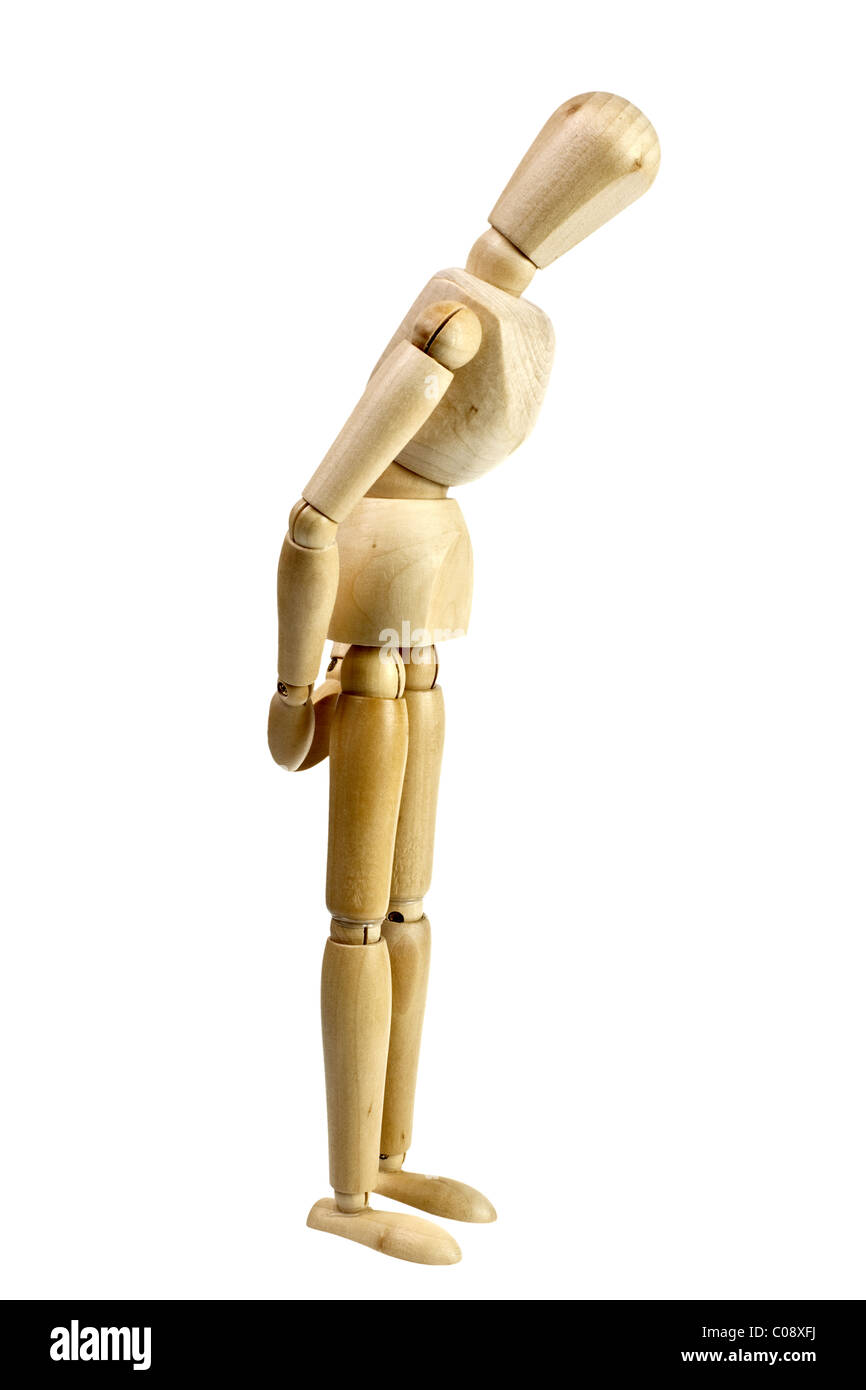 Wooden mannequin look down isolated on white background Stock Photo - Alamy