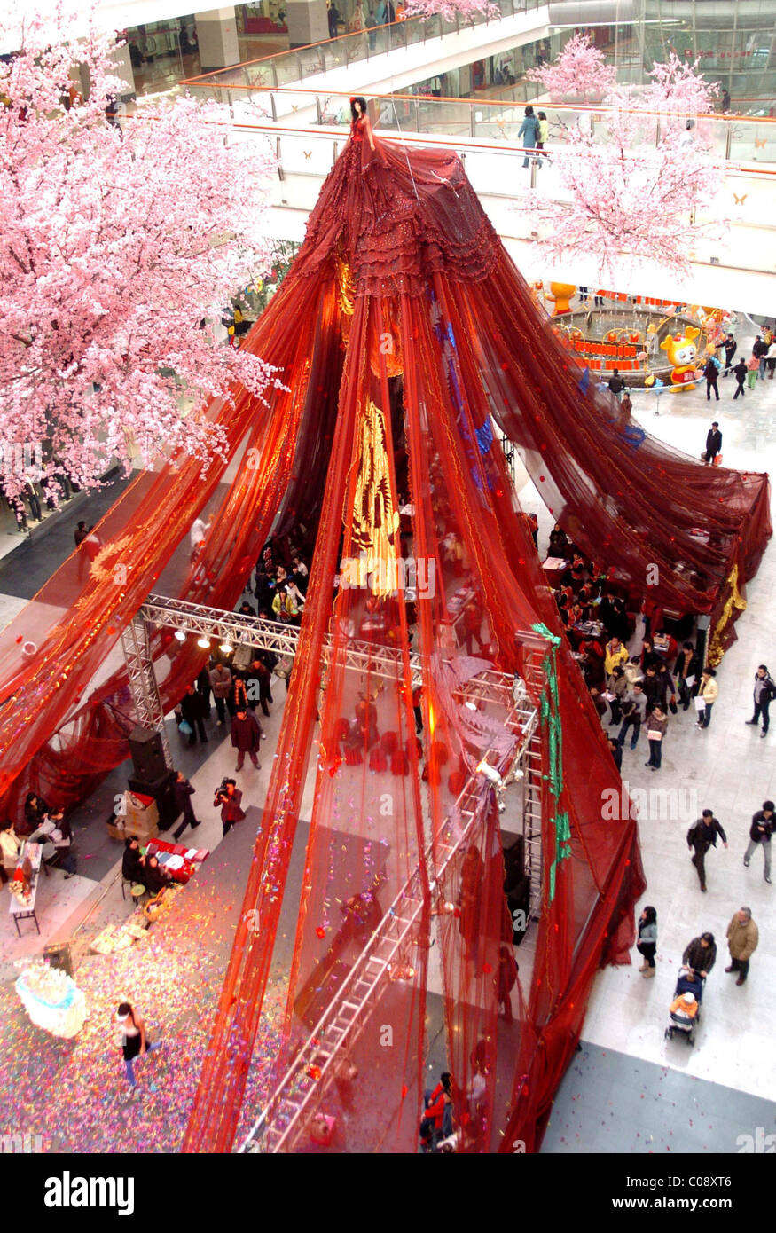 GIANT WEDDING GOWN TAKES FLIGHT Spanning a massive 999 metres, this ...