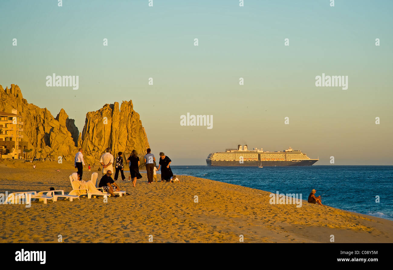 warm evening on pacific ocean people looking taking pictures having fun ...