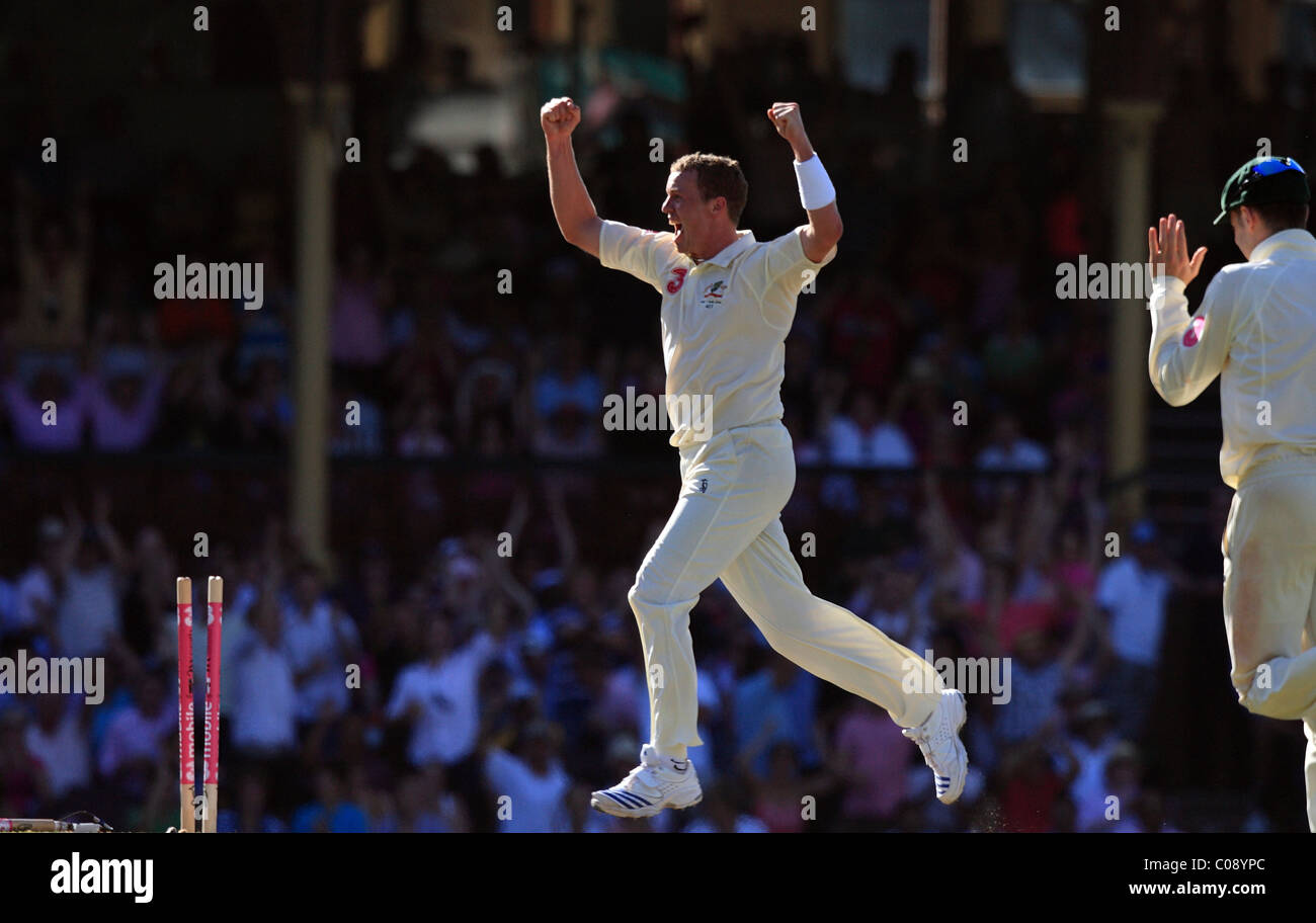Australian bowler Peter Siddle celebrates after bowling South African ...