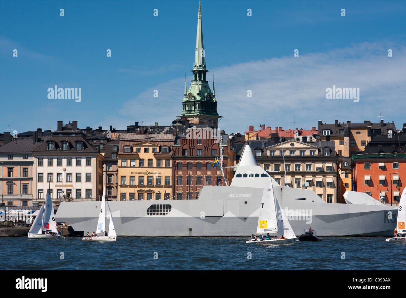Sailboats in the harbor with scenic views of the city of Stockholm ...