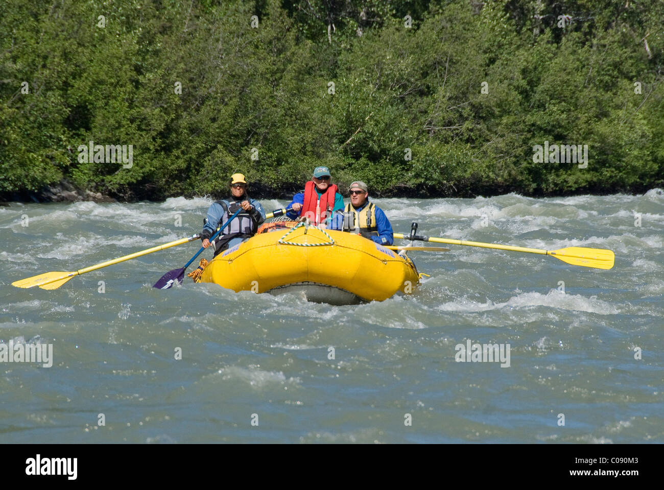 of rafters floating down rapids on the Tatshenshini River, Yukon ...