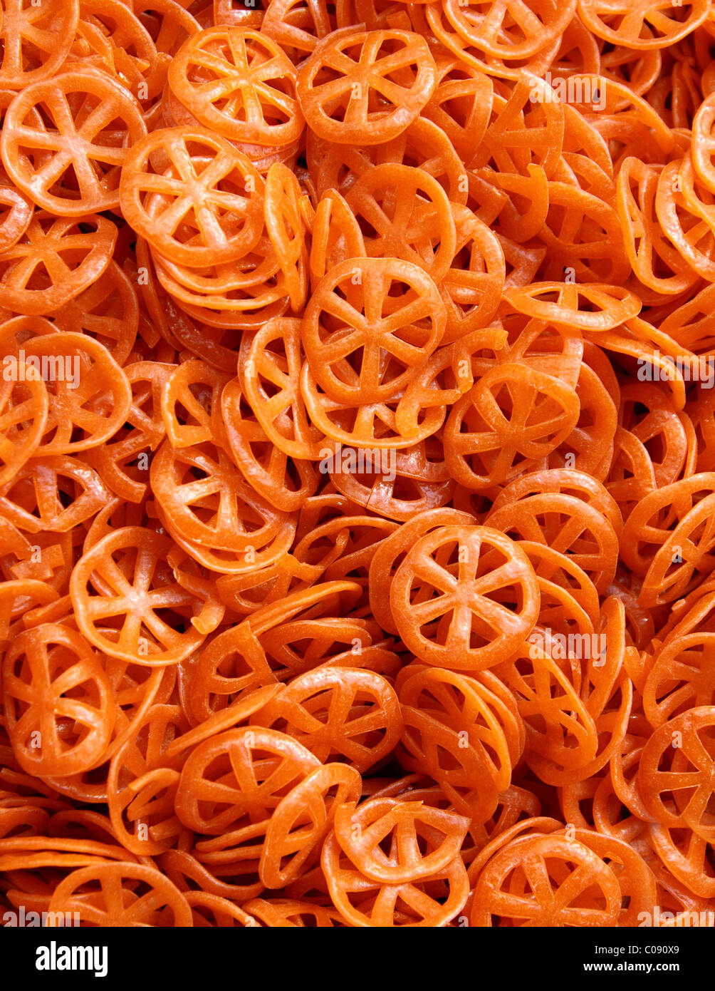 dried round pasta wheels in messy texture Stock Photo - Alamy