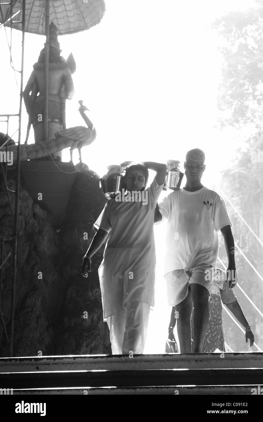 Devotees with milk offering during Thaipusam celebration Stock Photo ...