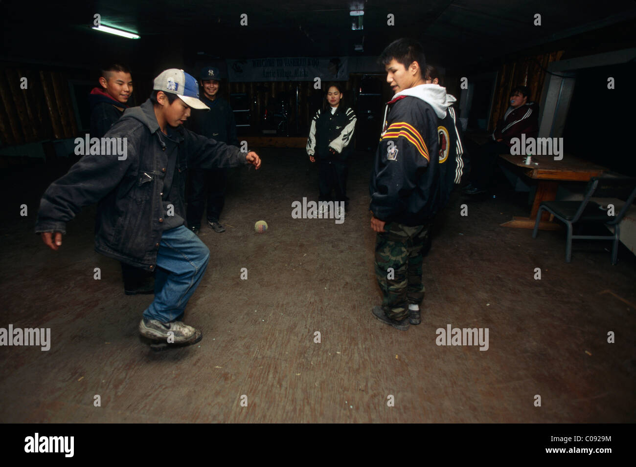 Two Alaskan native men dance indoors, Arctic Village, Arctic Alaska ...