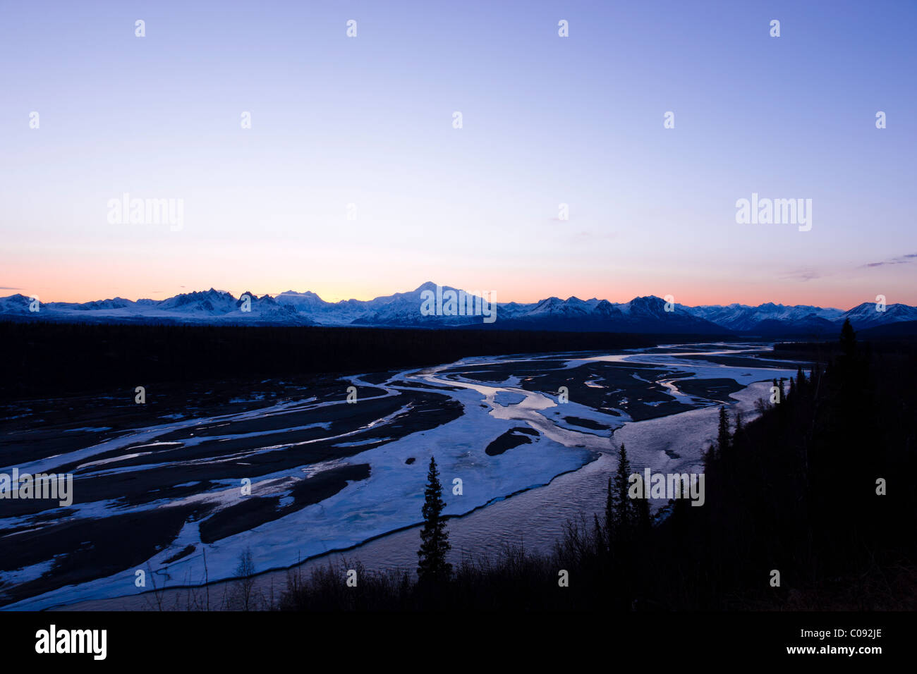 Sunset glow over southside Mount McKinley and the Alaska Range with ...