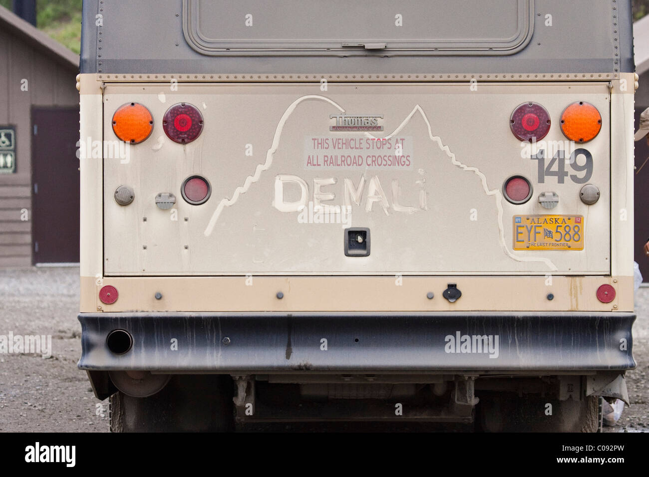 A Denali National Park tour bus has the outline of Mt. McKinley drawn ...