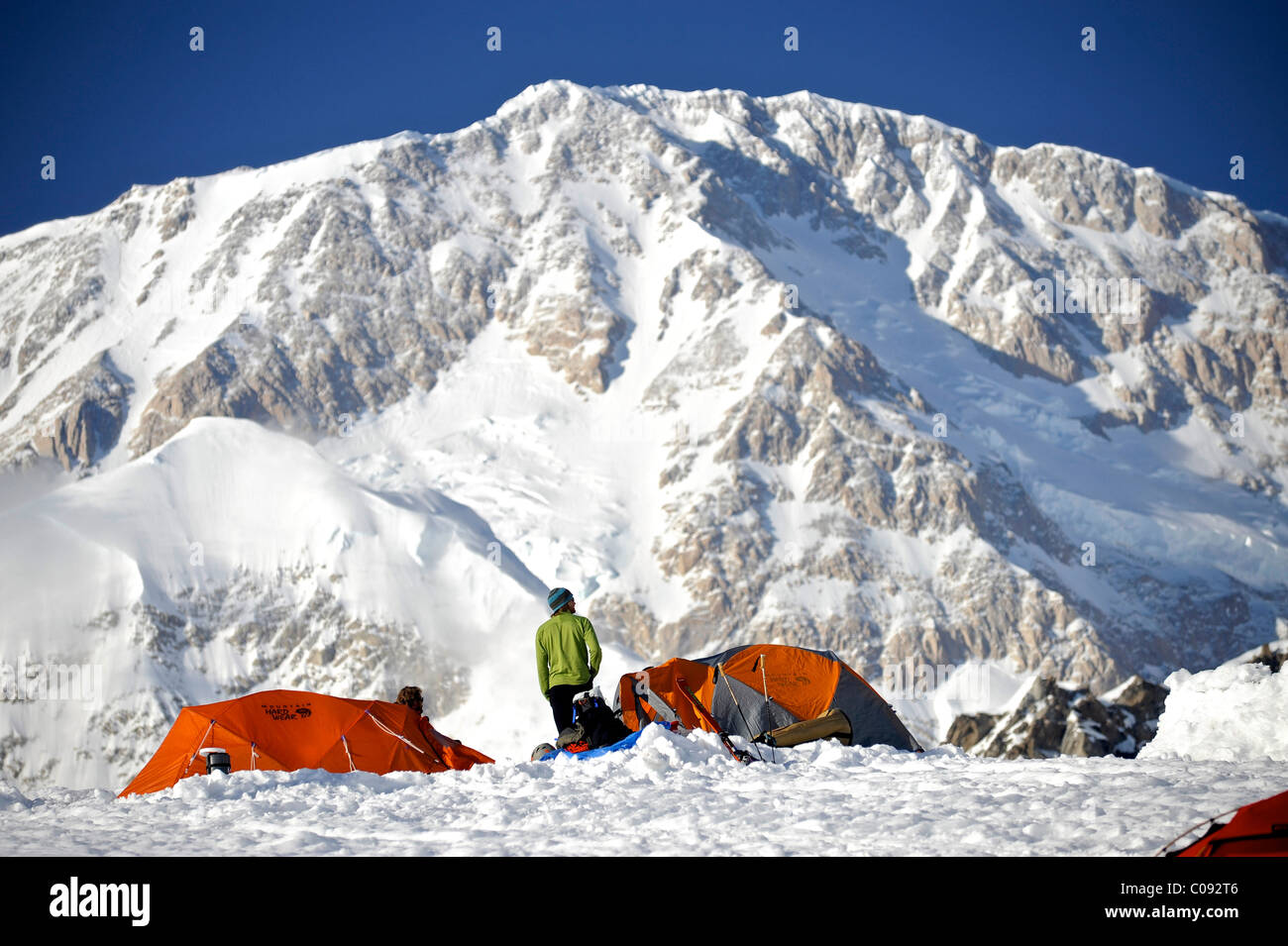 Climbers at the Kahiltna Base Camp with the South Face of Denali in the ...