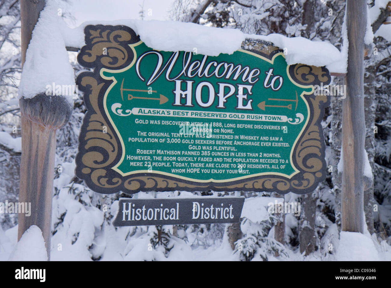 Snow covered welcome sign invites visitors to the town of Hope ...