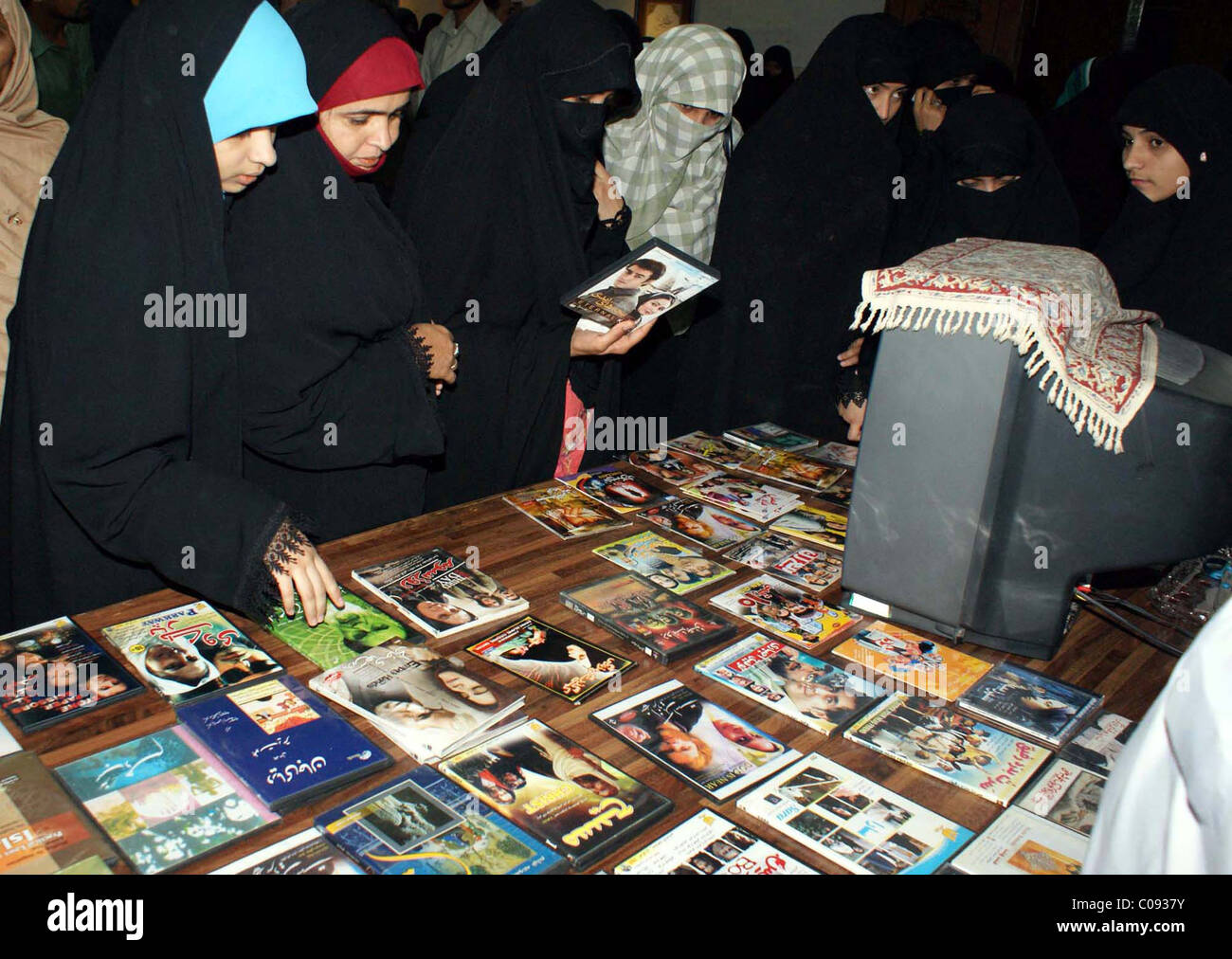 Women take keen at stalls during art exhibition of Iranian Artist Mehdi ...